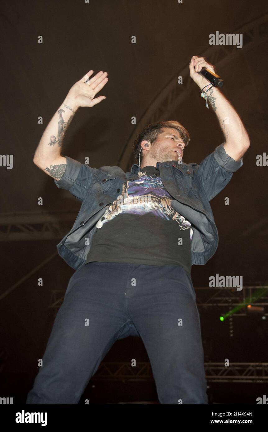 Sean Foreman of 3OH!3 performing on stage during Vans Warped Tour at ...