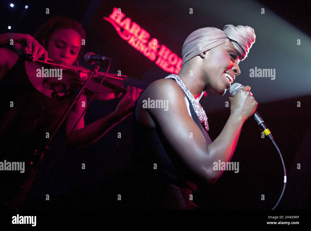 Laura mvula concert live music performance black dress turban concert ...