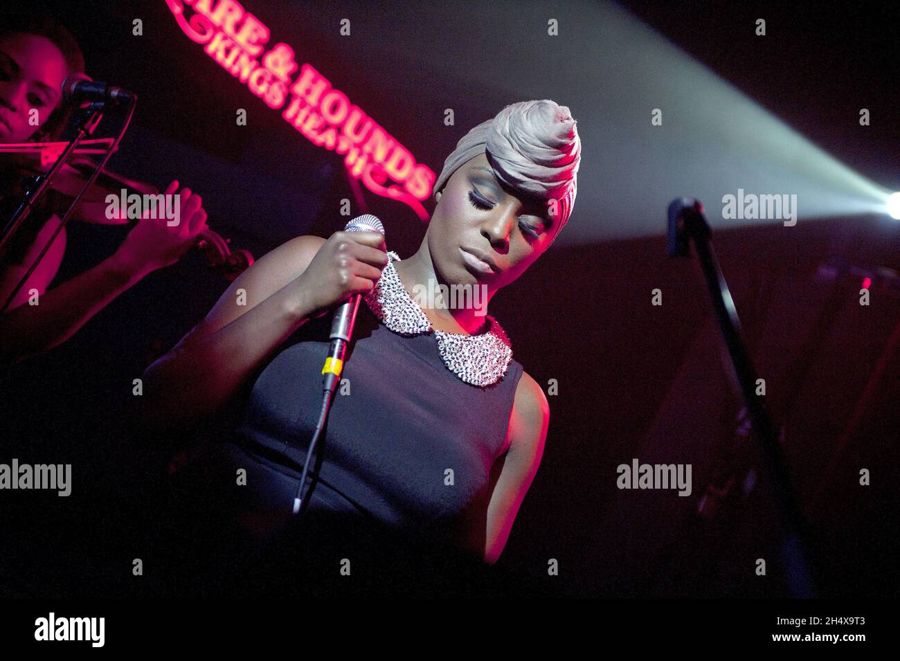 Laura mvula concert live music performance black dress turban concert ...