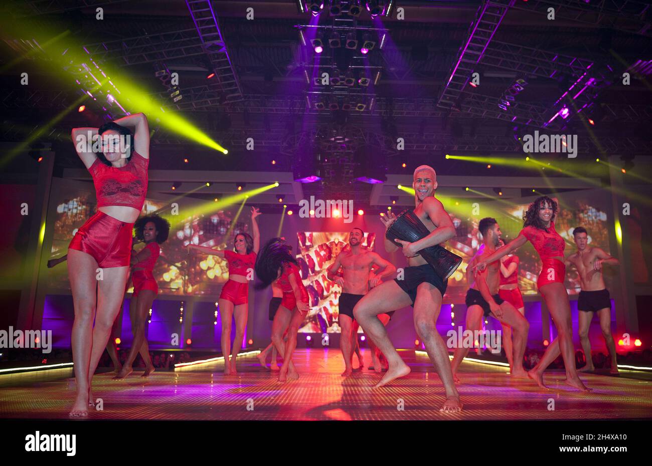 Dancers perform on the catwalk in the Suzuki Fashion Theatre during The ...