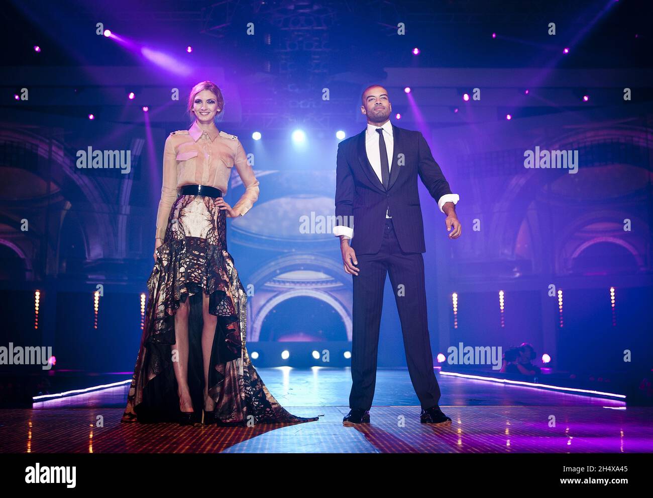 Models walk down the catwalk in the Suzuki Fashion Theatre during The ...