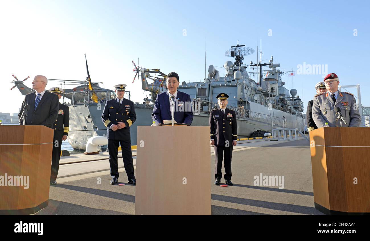Japanese Defense Minister Nobuo Kishi (C) and Gen. Eberhard Zorn (far R ...