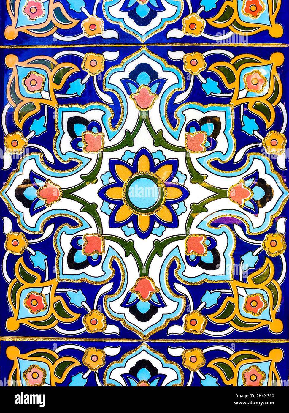 traditional Uzbek pattern on the ceramic tile on the wall of the mosque ...