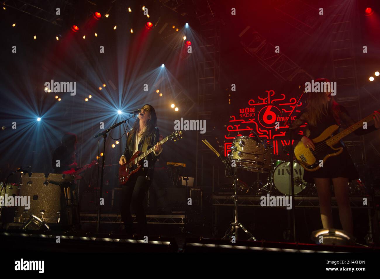 Haim performing live on stage during the BBC 6Music Festival in ...