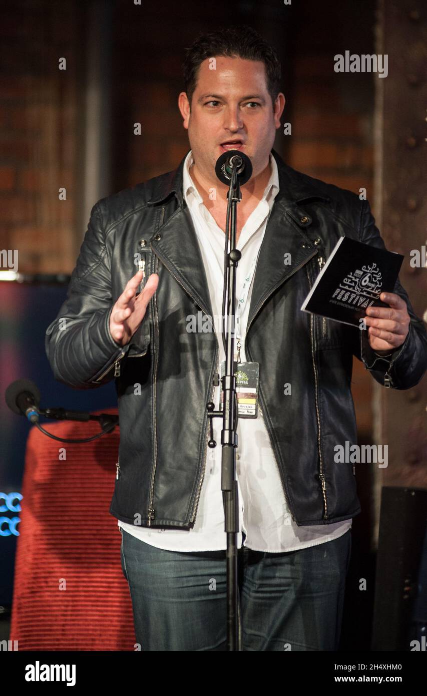 BBC Radio 6 presenter introduing performance on stage 2 during 6 Music ...