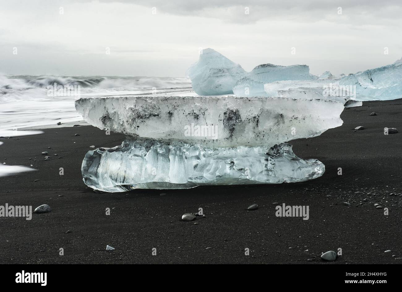 Giant blocks of ice awashed on the black volcanic beach by Jokulsarlon ...