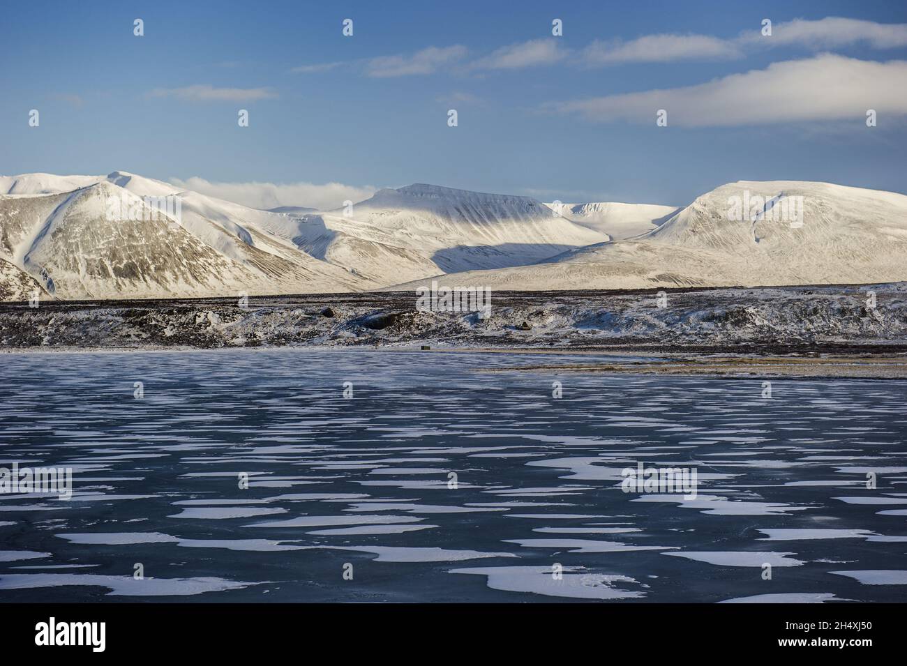 View from Vatnsnes peninsula across Hop towards Skagi peninsula ...