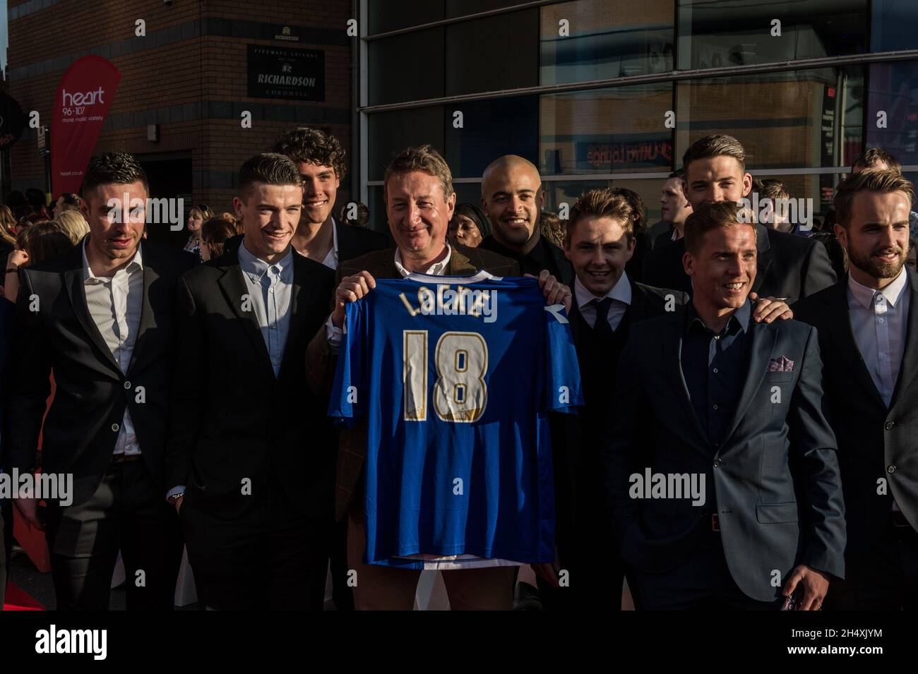 Director Steven Knight posing Birmingham City Footbal players before ...