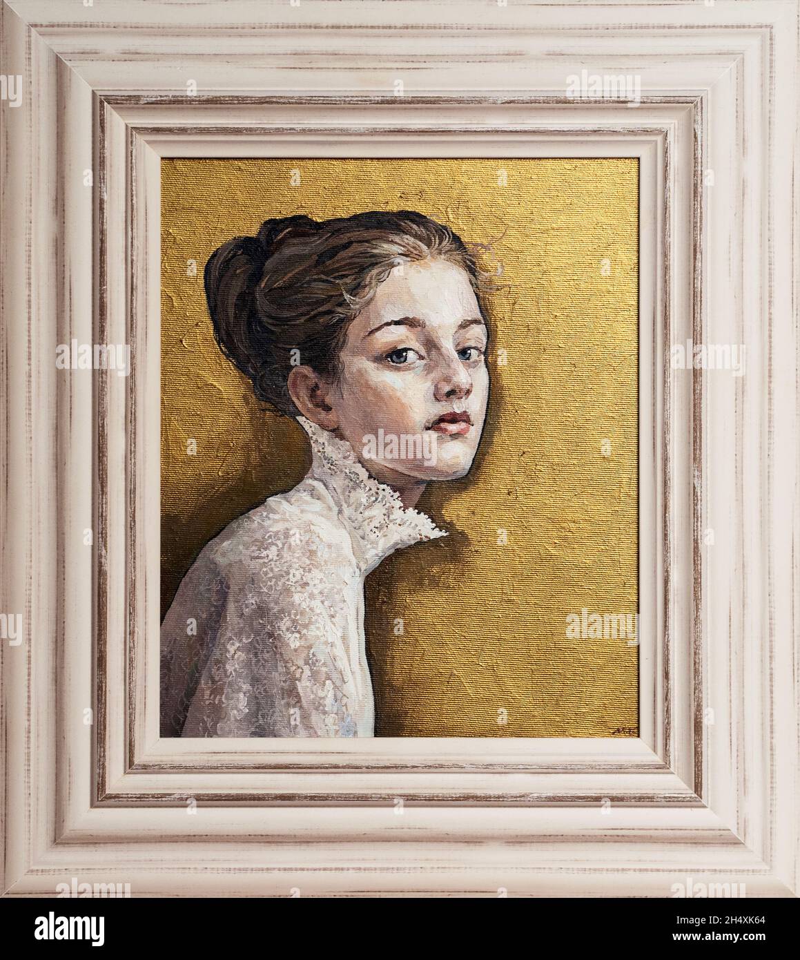 Framed oil painting. Portrait of a girl on a gold background Stock ...
