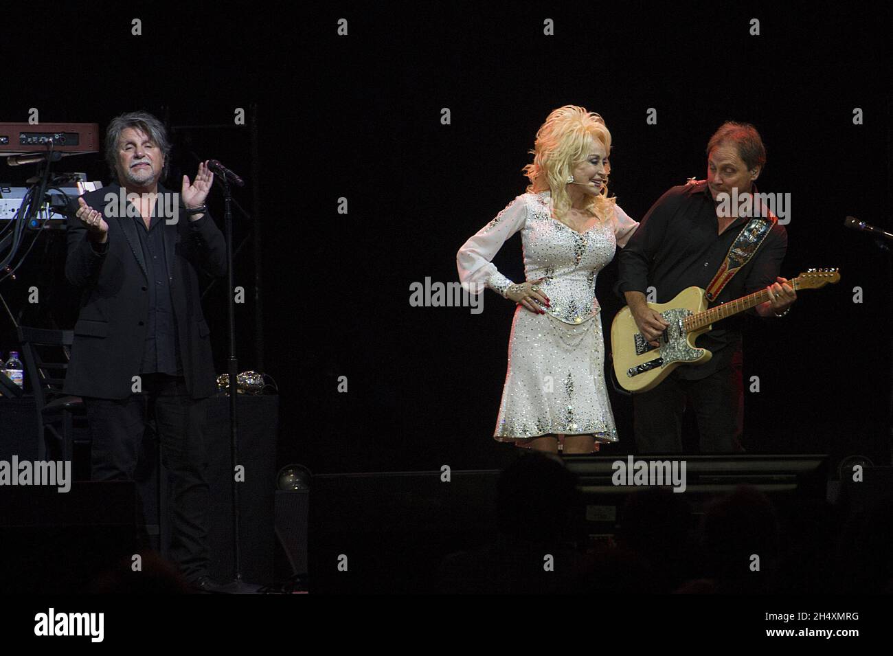 Dolly Parton live on stage at the LG Arena in Birmingham Stock Photo ...