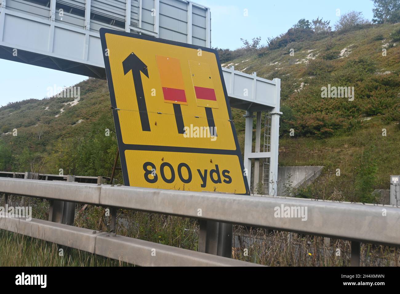 Roadwork signs to indicate lane closure distance Stock Photo - Alamy