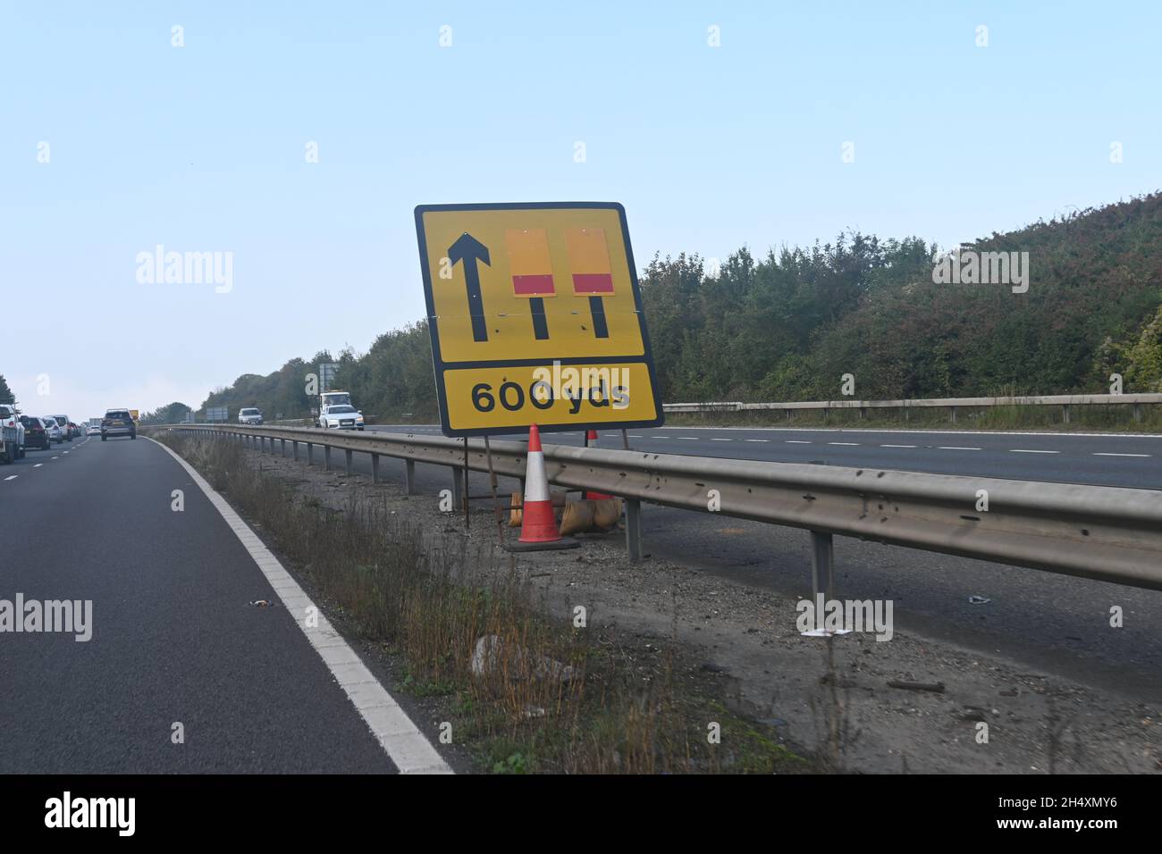 Roadwork signs to indicate lane closure distance Stock Photo - Alamy