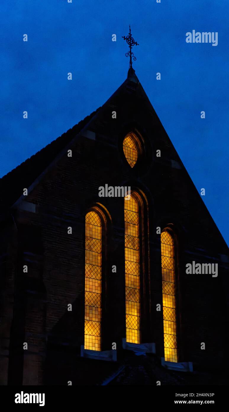 Illuminated church windows night hi-res stock photography and images ...