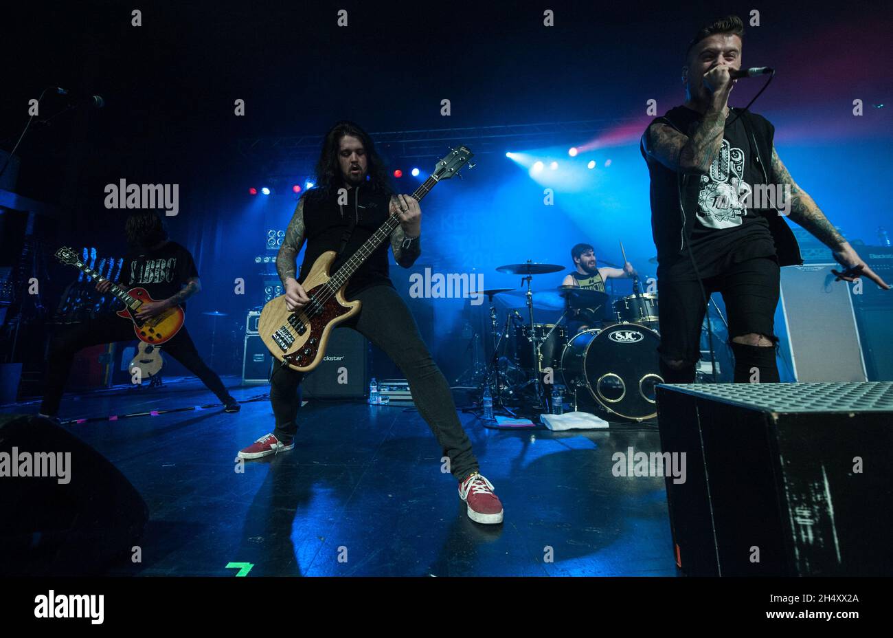 Daniel Winter-Bates of Bury Tomorrow live on stage during Kerrang Tour ...