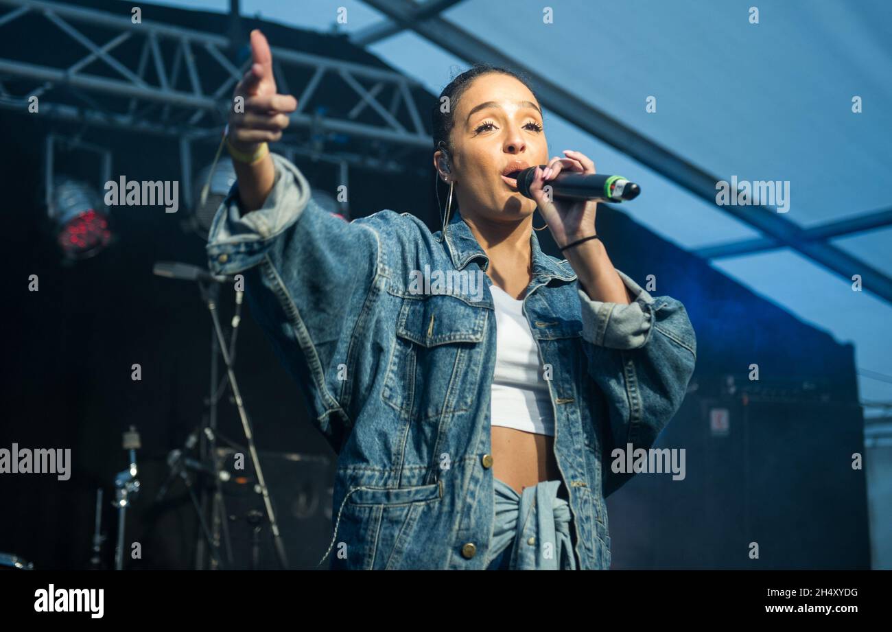 Annie Ashcroft, Frankee Connolly, Nadine Samuels of M.O. performing ...