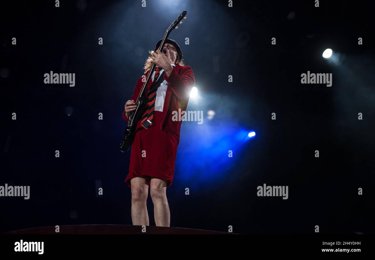 Angus Young of AC/DC performing live on stage at Wembley Stadium on ...