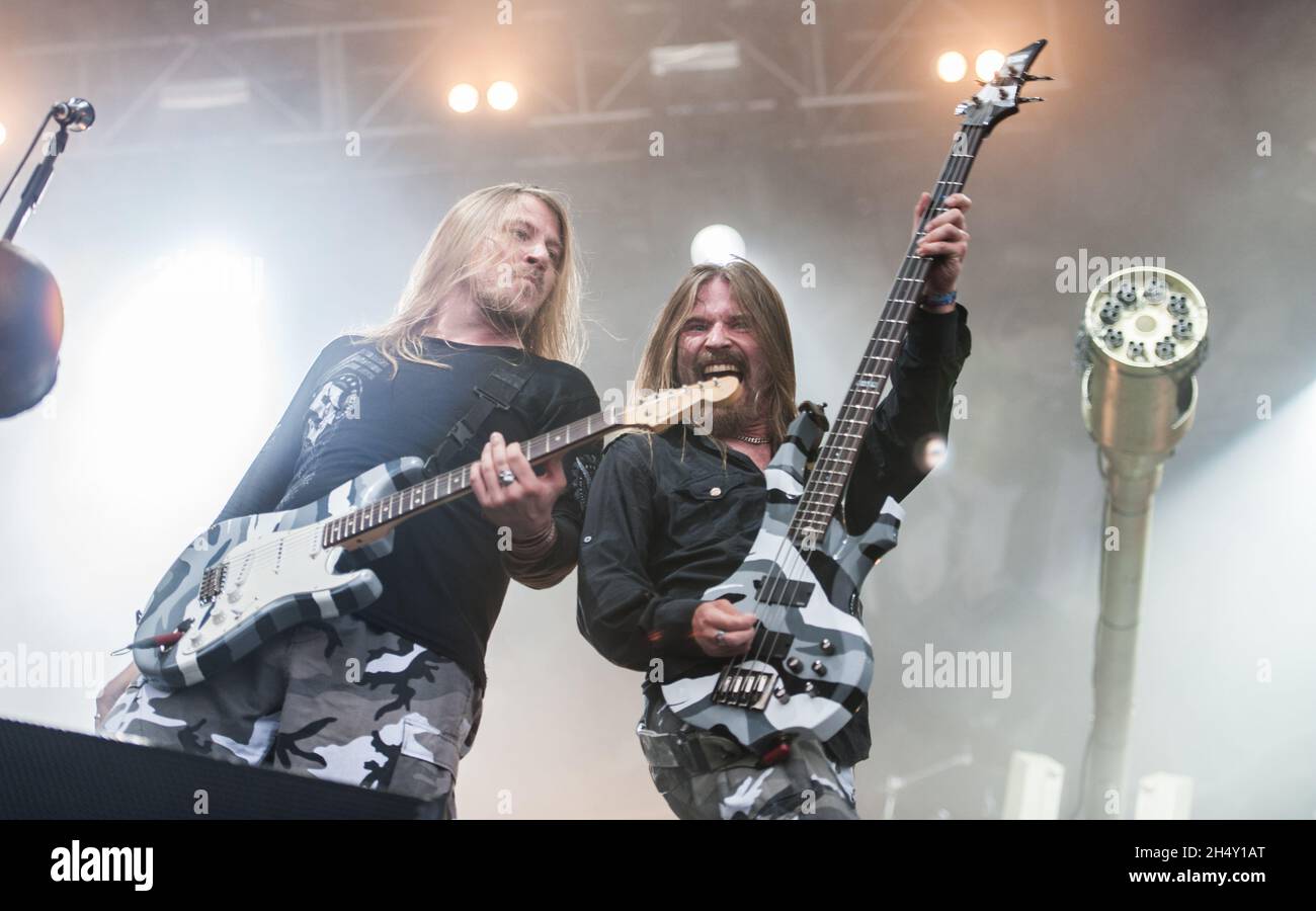Thobbe Englund and Par Sundstrom of Sabaton performing live on stage ...