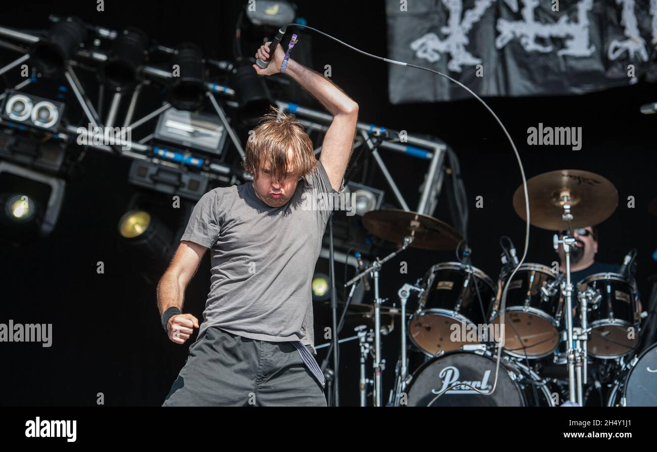 Mark Greenway of Napalm Death performing live on stage during ...