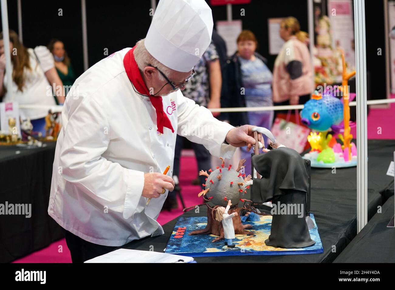 Judging takes place of the competition cakes during Cake International ...