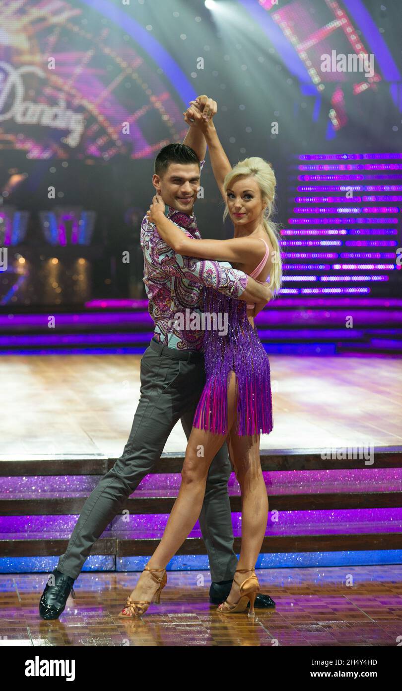 Helen George and Aljaz Skorjanec posing during Strictly Come Dancing ...