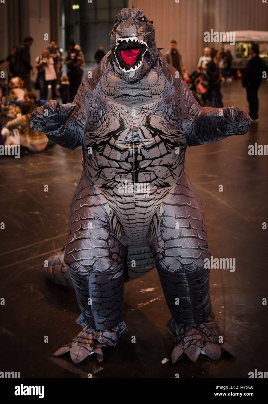 Visitor in Godzilla costume attending Comicon at the NEC on March 20 ...
