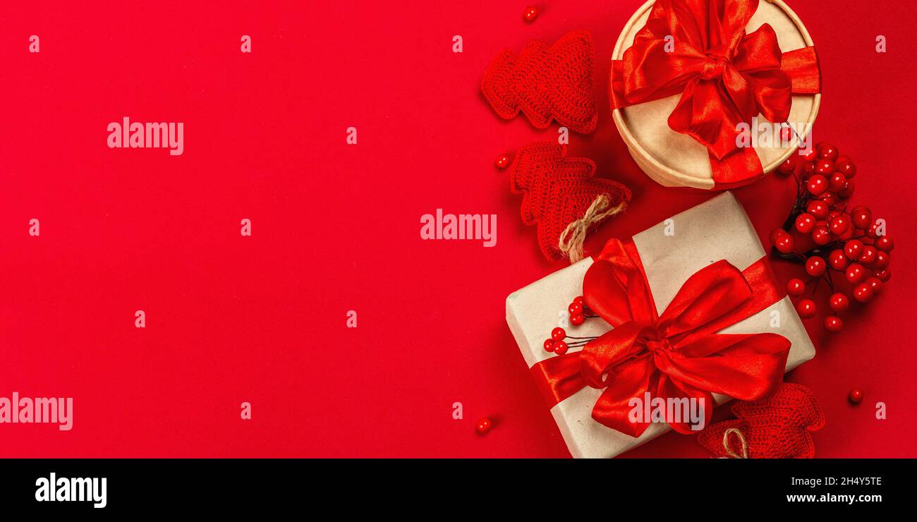Gift concept in red colors. New Year or Christmas, festive mood ...