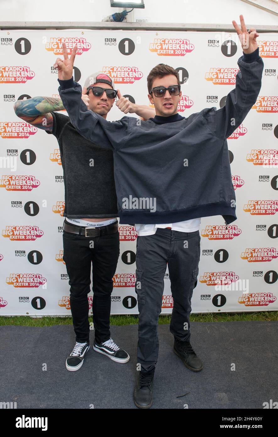 Tyler Joseph and Josh Dun of Twenty One Pilots posing backstage on day ...