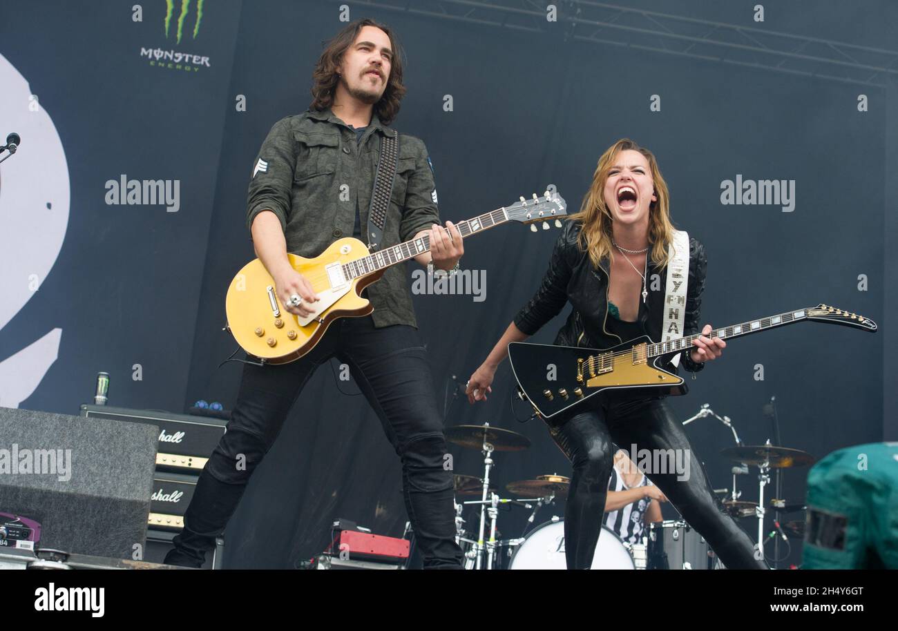 Lzzy Hale and Joe Hottinger of Halestorm performing live on day 3 of ...