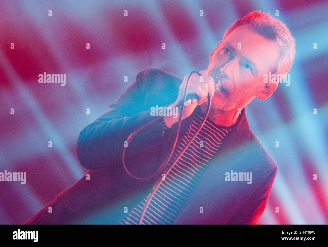 Jim Reid of The Jesus and Mary Chain performing live on stage during ...