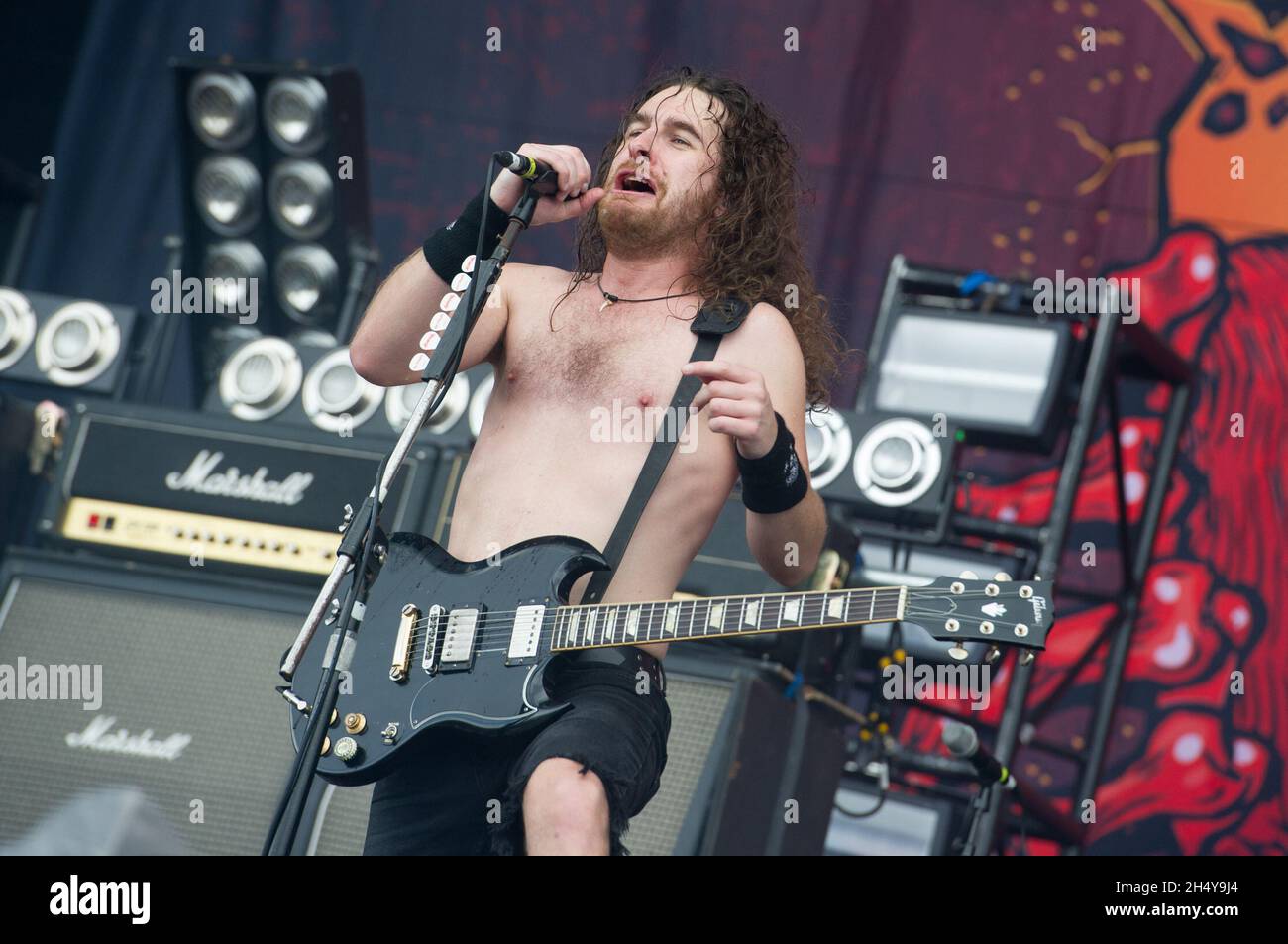 Joel O'Keeffe lead singer of Airbourne performing live on stage on day ...