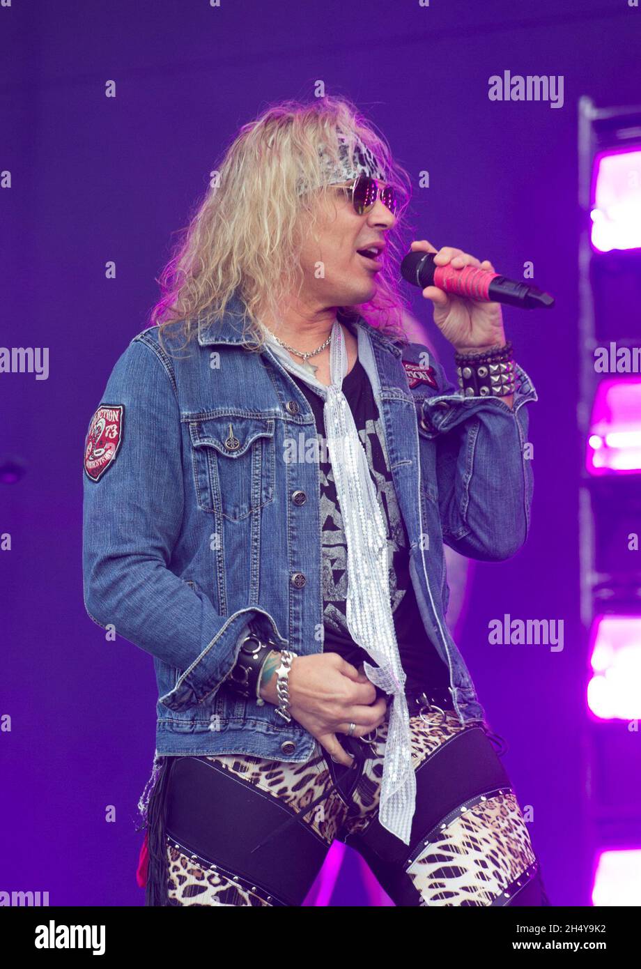 Michael Starr of Steel Panther performing live on stage on day 3 of ...