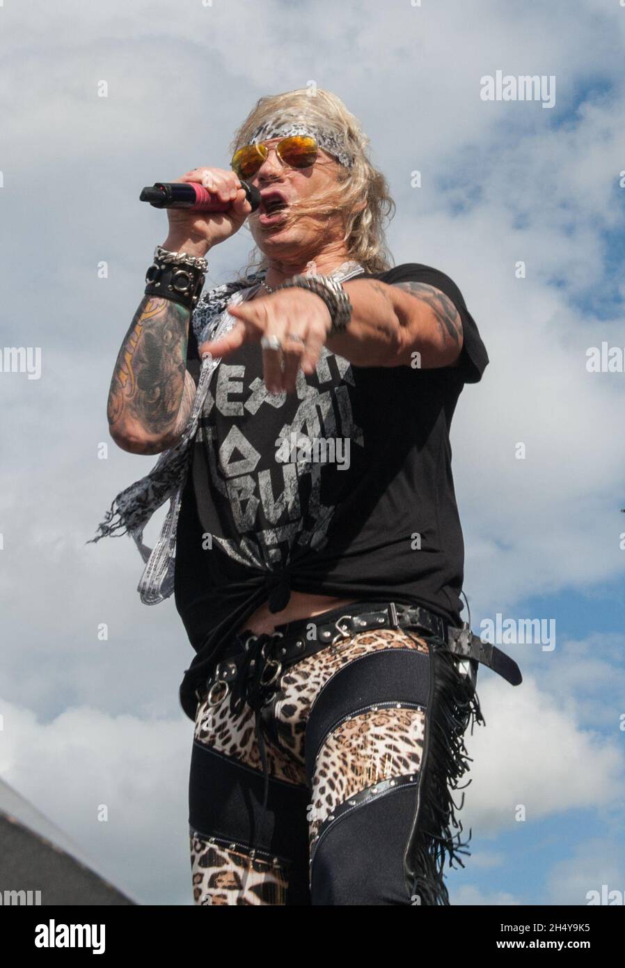 Michael Starr of Steel Panther performing live on stage on day 3 of ...