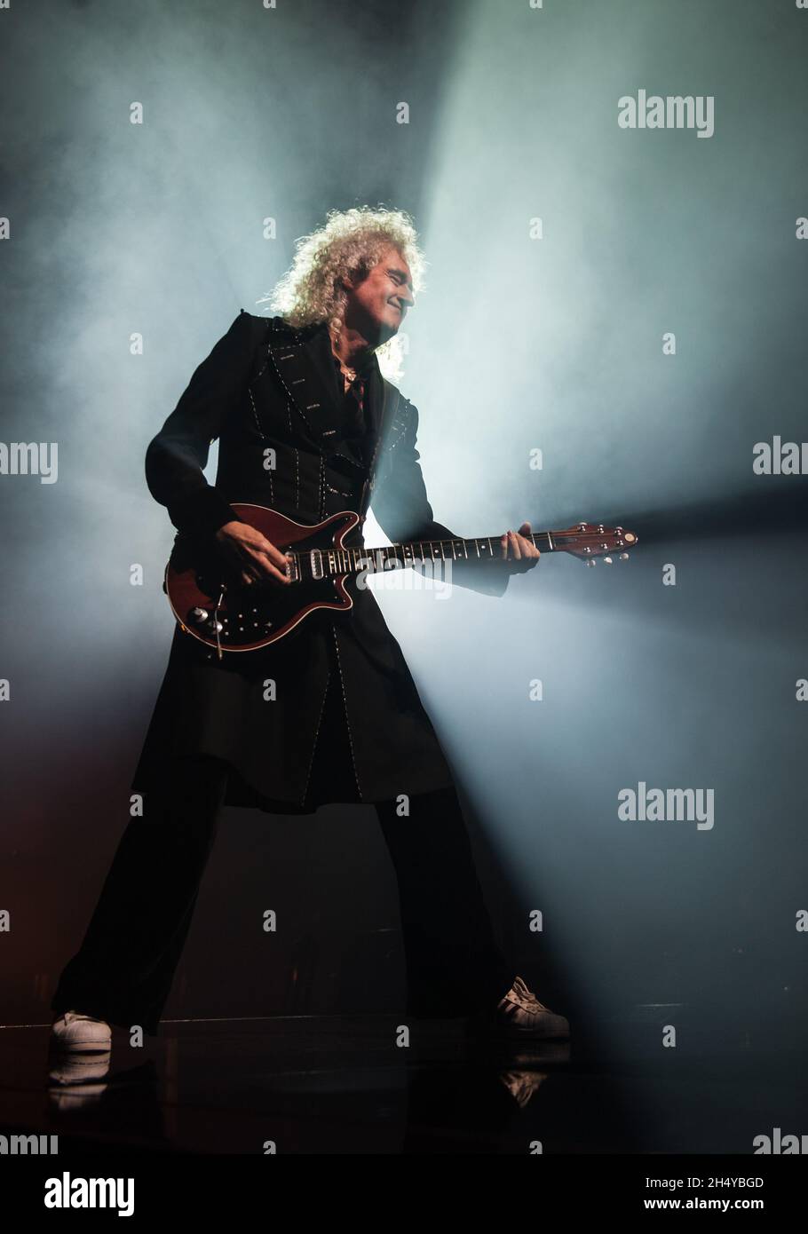 Brian May of Queen performing with Adam Lambert live on stage at Arena ...