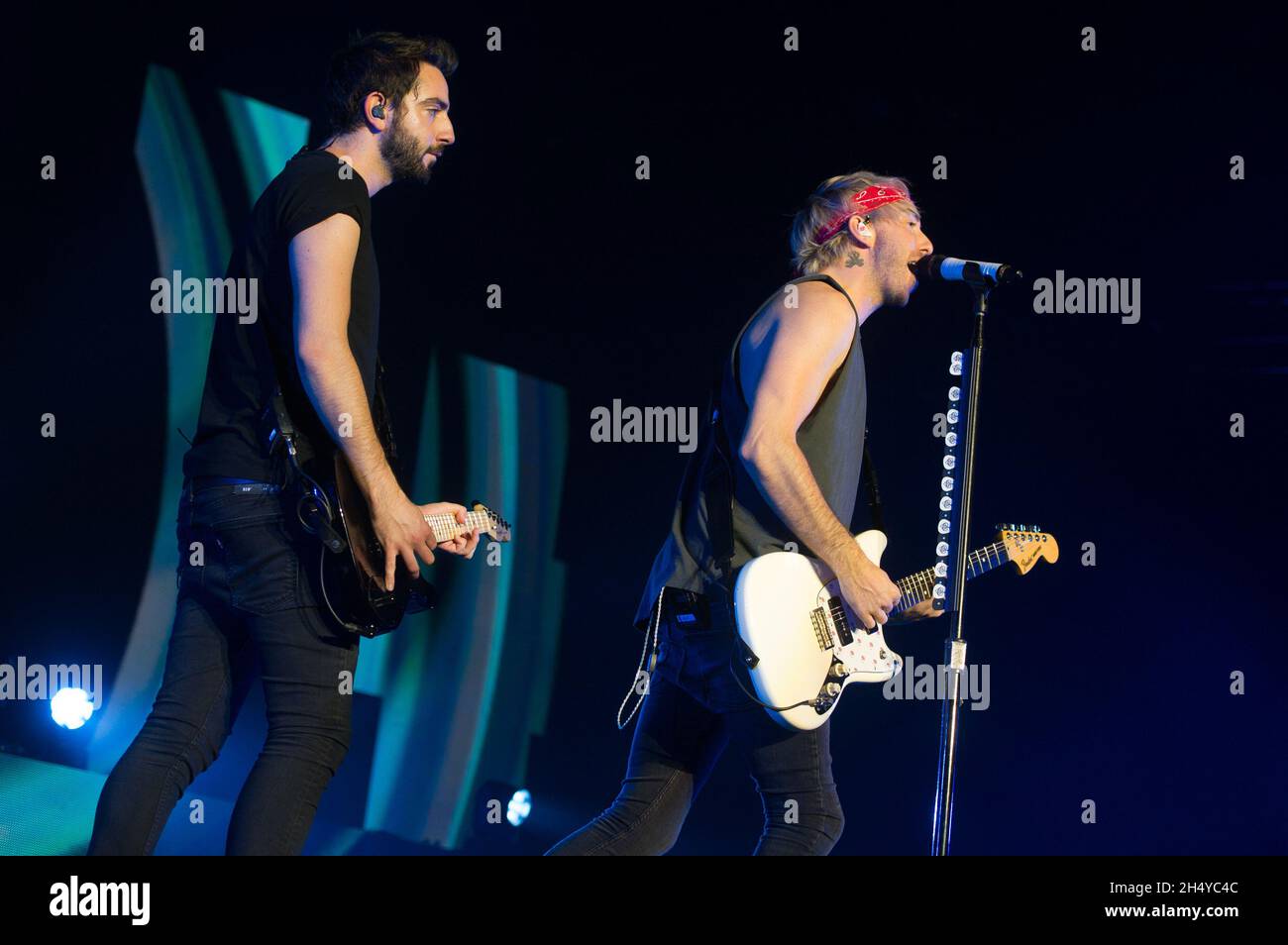 Alex Gaskarth and Jack Barakat of All Time Low perform on stage at ...