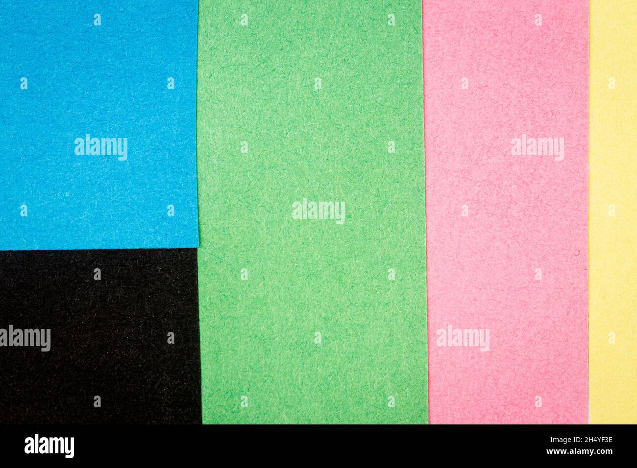 Multicolor background from a paper of different colors. Abstract ...