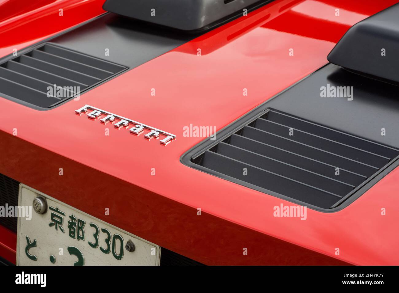 Close up detail of the engine deck cover on the rear of a red 1970s ...