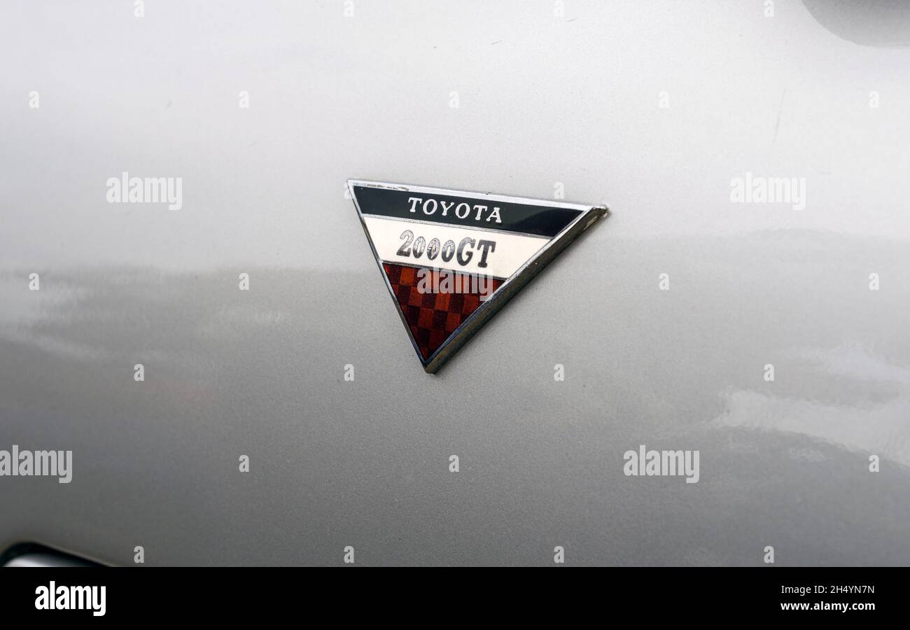 Close up detail of the enamel logo emblem badge on the side of a silver ...