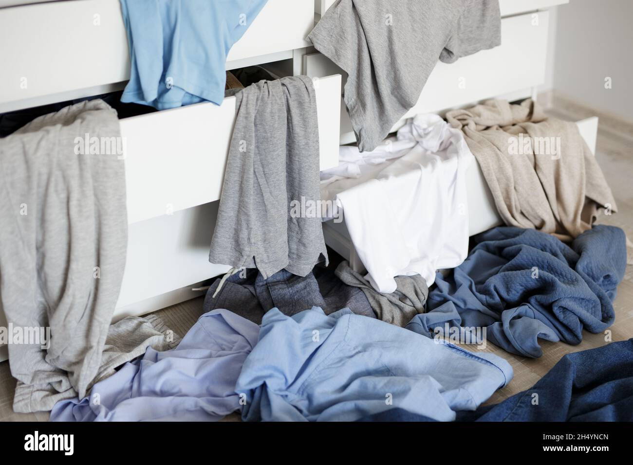 close up of dirty laundry in the chest of drawers Stock Photo - Alamy