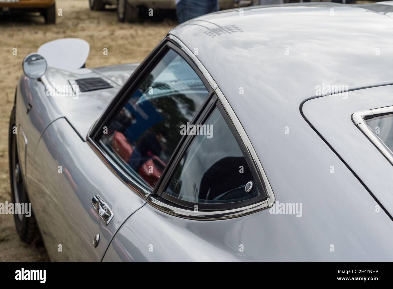 Close up detail of the side windows and roof on a silver Toyota 2000 GT ...