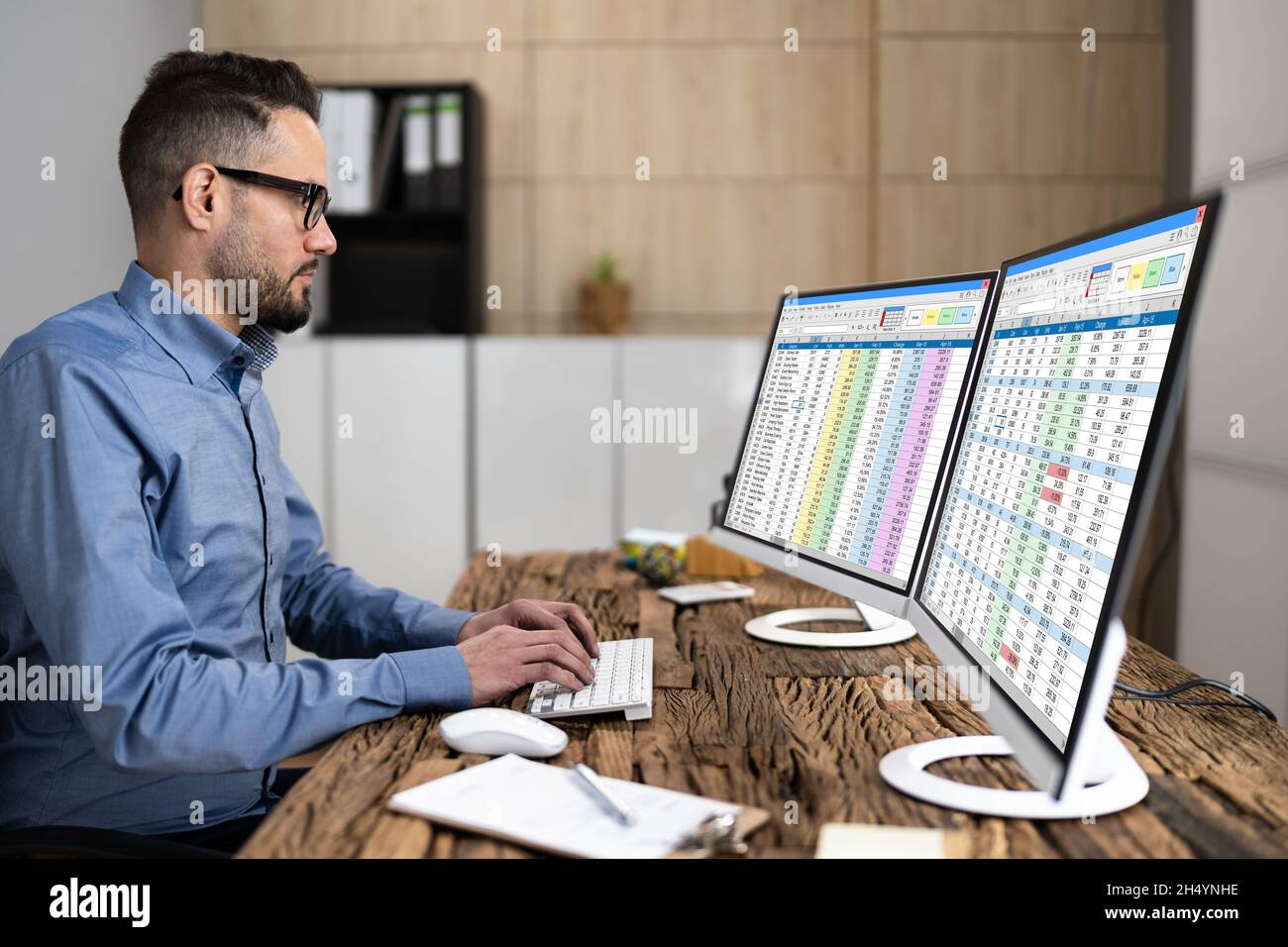 Professional man analyzing data hi-res stock photography and images - Alamy