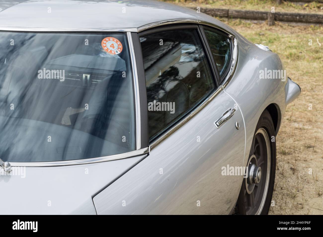 Close up detail of on a silver Toyota 2000 GT classic Japanese sixties ...