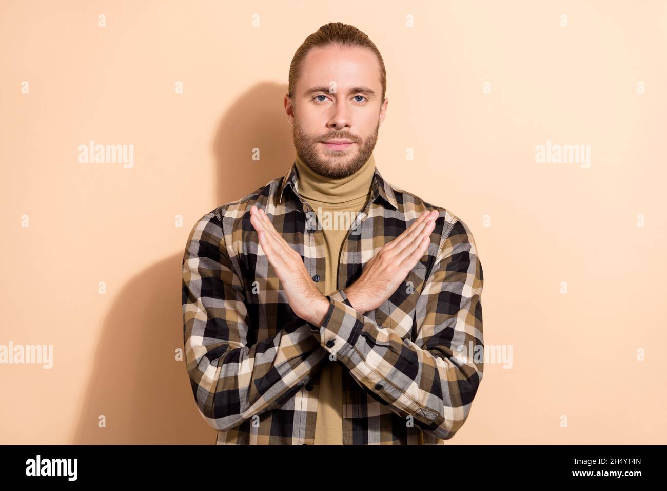Photo of young man crossed hands demonstrate stop symbol protest ...