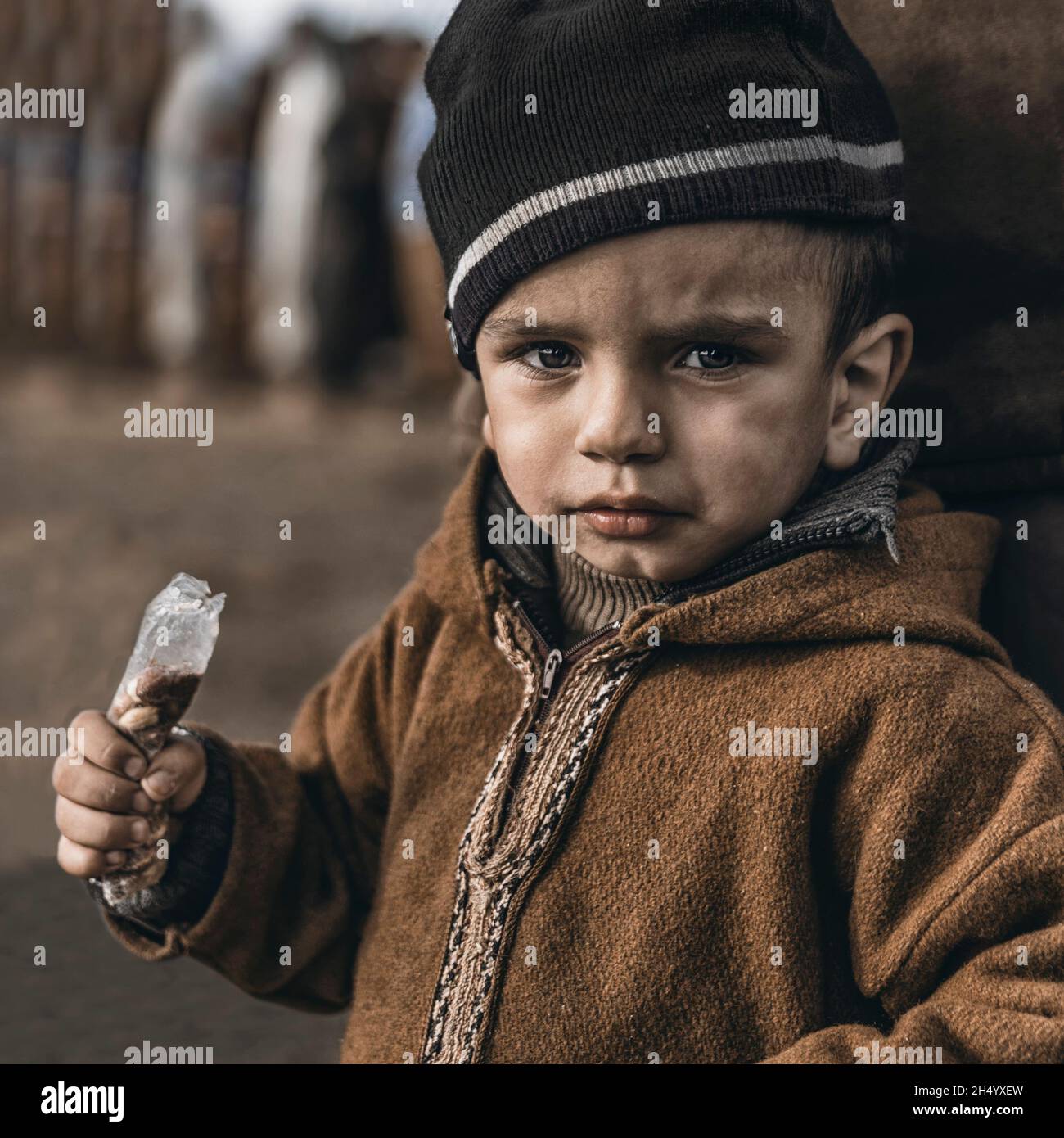 poor child smiles to life Stock Photo - Alamy