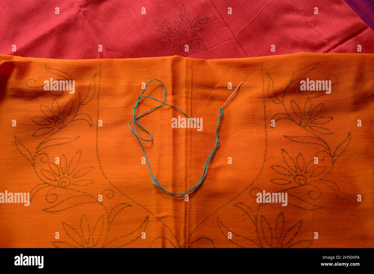 Beautiful design ready on the cloth for Hand Embroidery Stock Photo - Alamy
