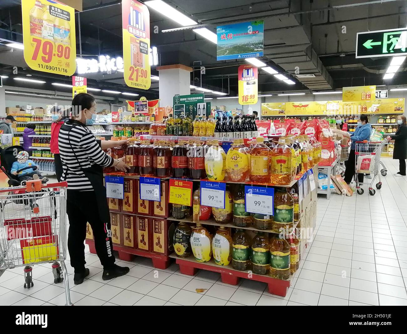 BEIJING, CHINA - NOVEMBER 5, 2021 - A customer selects goods at a ...