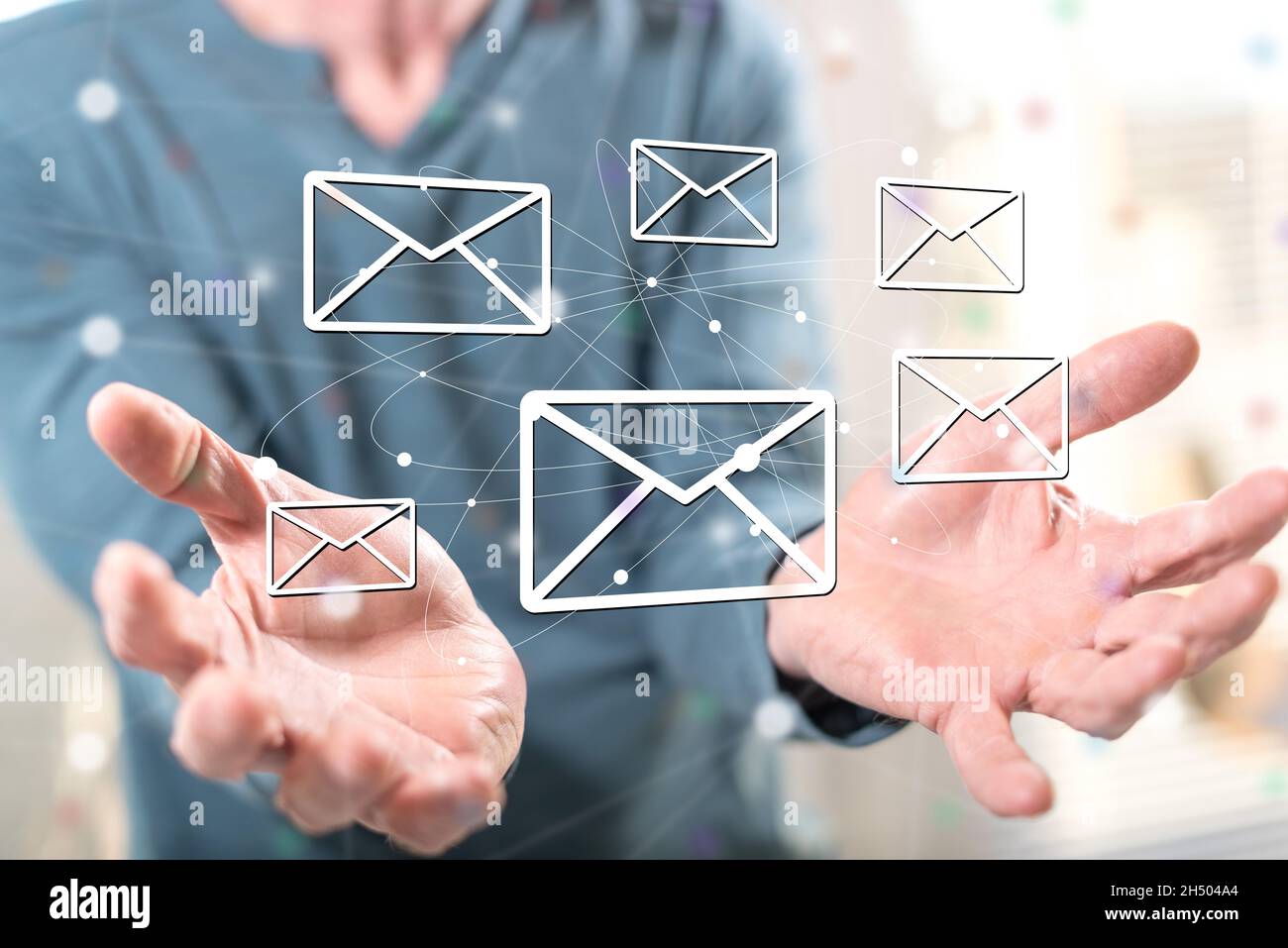 Message concept above the hands of a man in background Stock Photo - Alamy