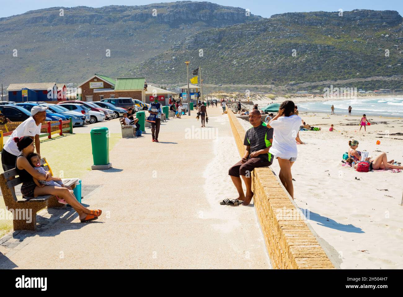 CAPE TOWN, SOUTH AFRICA - Oct 11, 2021: A bunch of people at a beach in ...