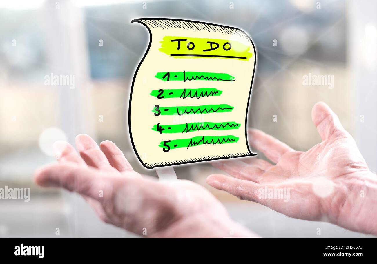To do list concept above the hands of a man Stock Photo - Alamy