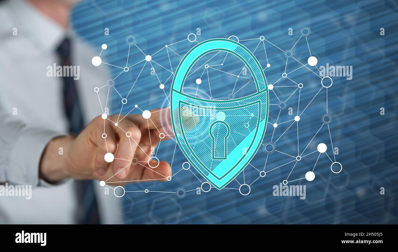 Man touching a network safety concept on a touch screen with his finger ...