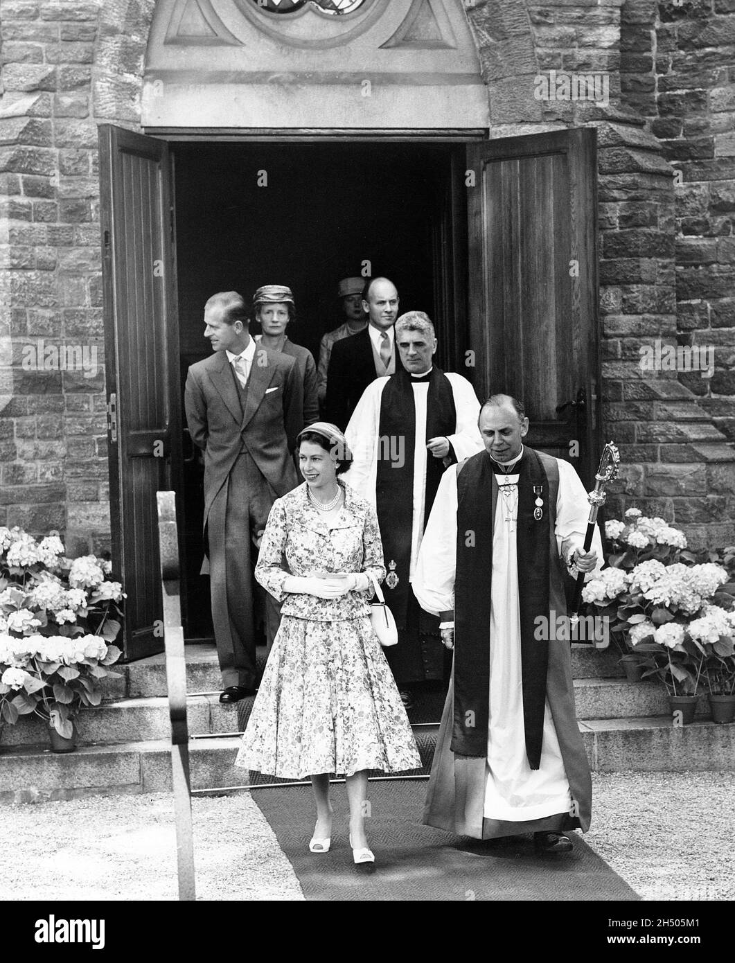 Queen Elizabeth II leaving the Anglican Church of St Peter and St ...